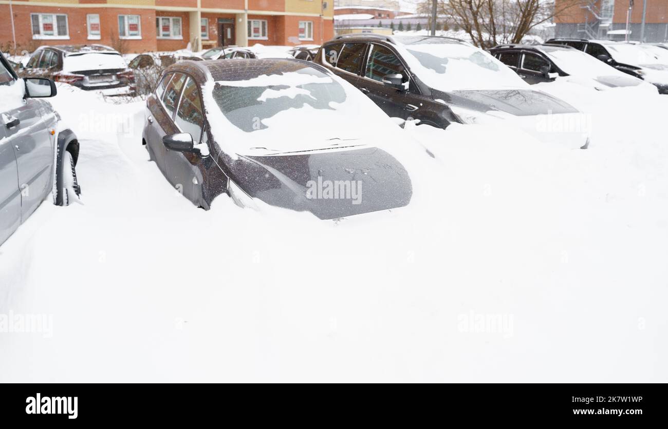 Russia Moscow 13.02.2021 Cars on street covered with snow. City winter ...