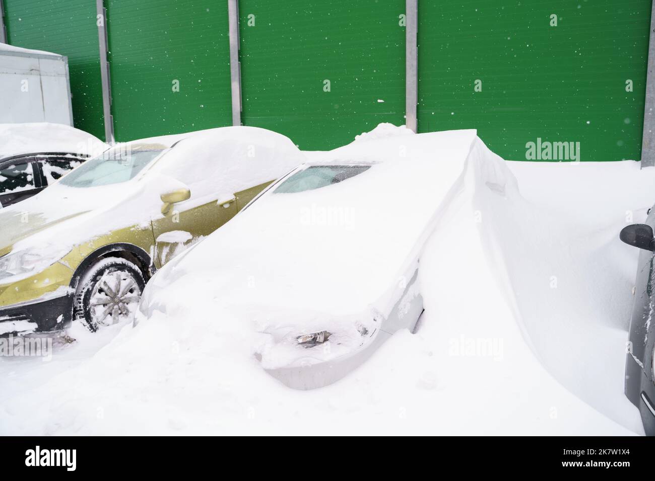 Russia Moscow 13.02.2021 Cars on street covered with snow. City winter ...