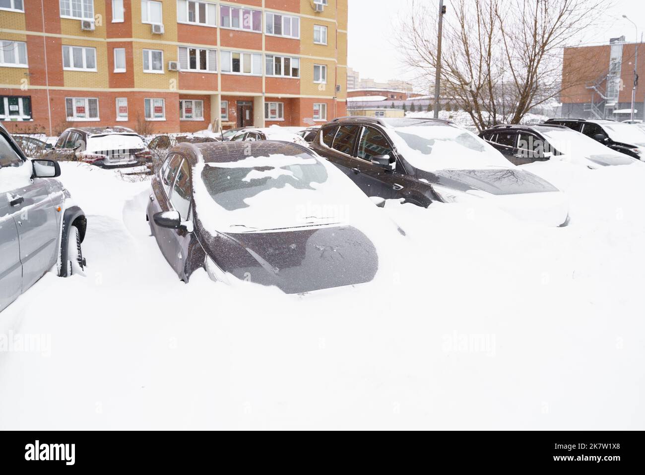 Russia Moscow 13.02.2021 Cars on street covered with snow. City winter ...