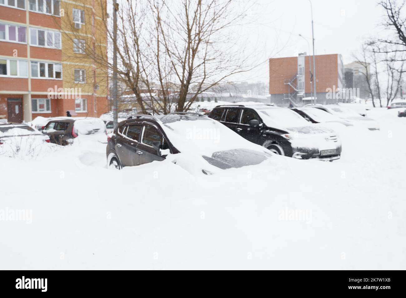 Russia Moscow 13.02.2021 Cars on street covered with snow. City winter ...