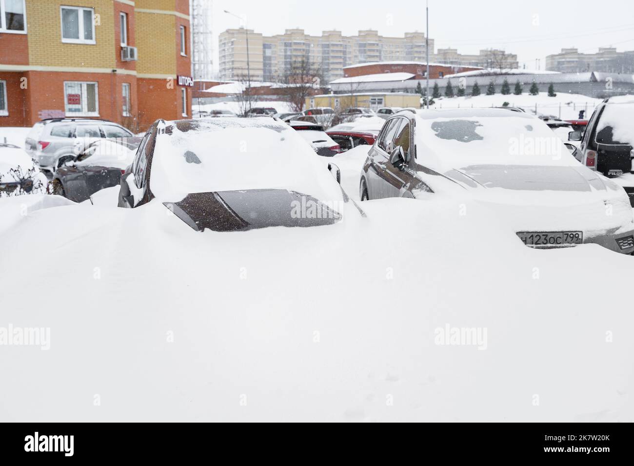 Russia Moscow 13.02.2021 Cars on street covered with snow. City winter ...