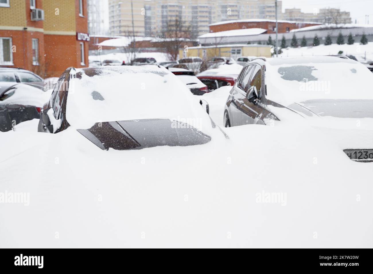 Russia Moscow 13.02.2021 Cars on street covered with snow. City winter ...