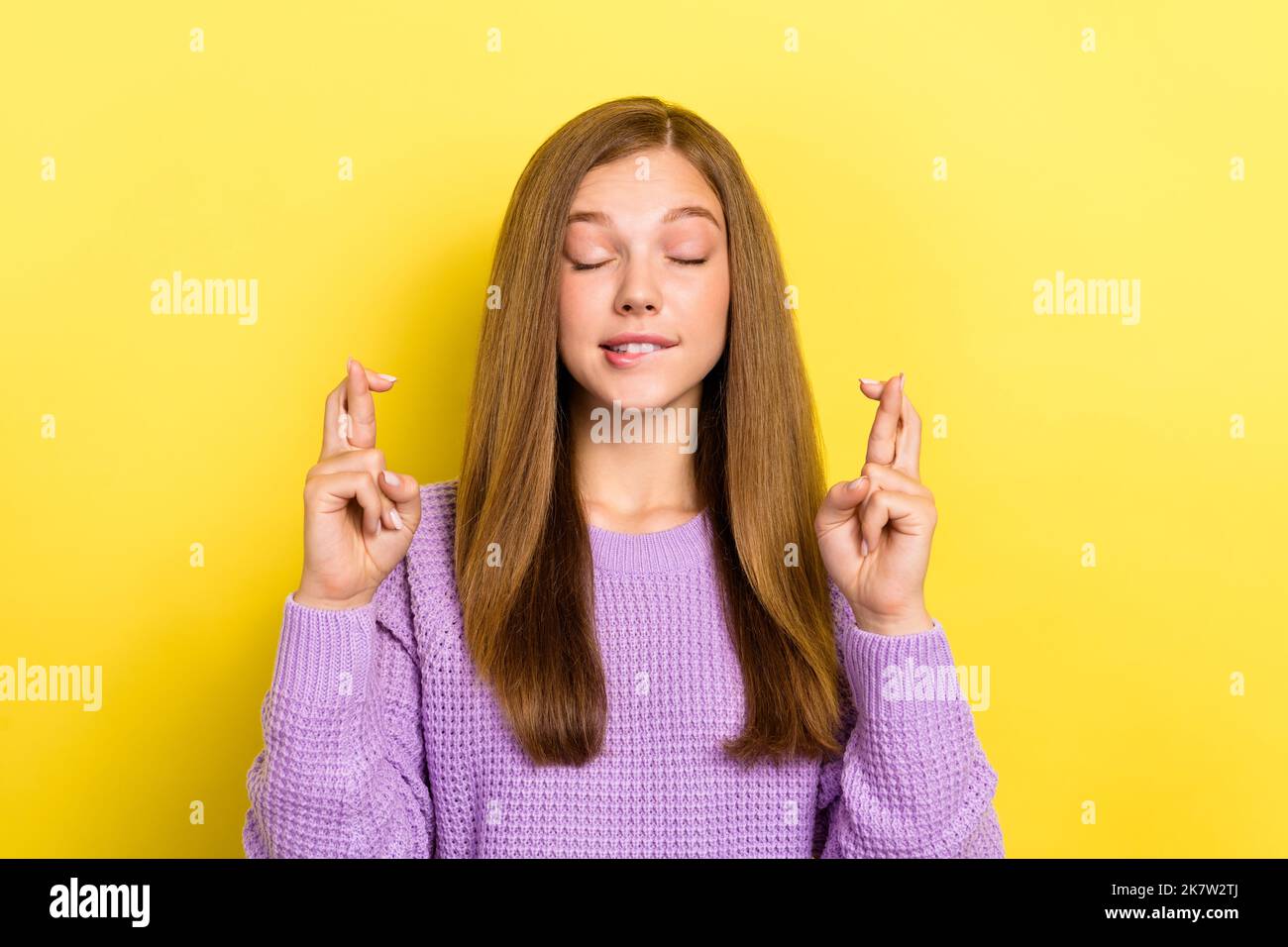 Portrait photo of dreamy positive girlish teenager bite lips want ...