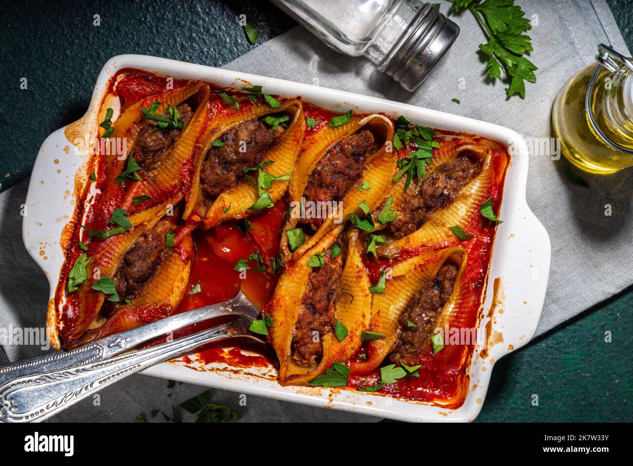 Homemade pasta shells, italian conchiglioni stuffed with ground minced ...