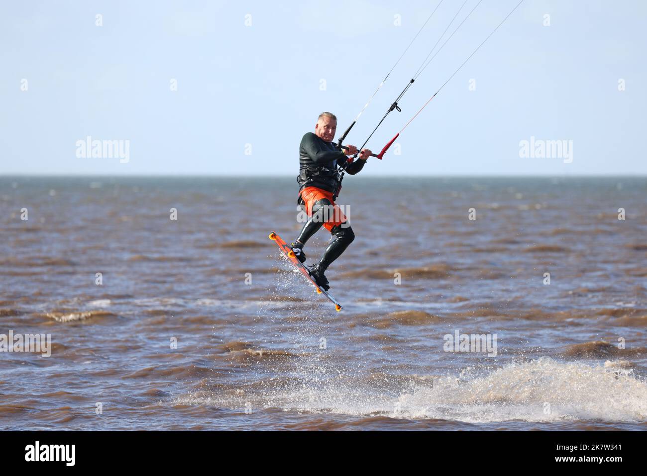 Heacham, UK. 17th Oct, 2022. Kitesurfers enjoy the windy conditions in ...