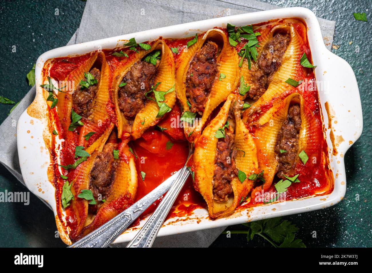 Homemade pasta shells, italian conchiglioni stuffed with ground minced ...