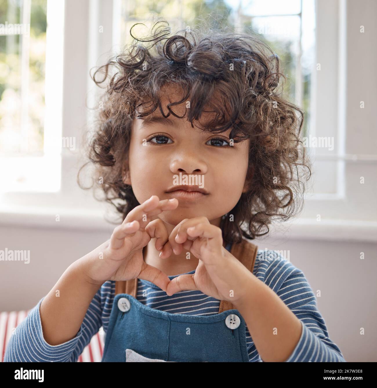 An age before jaded pessimism. Portrait of an adorable young boy ...