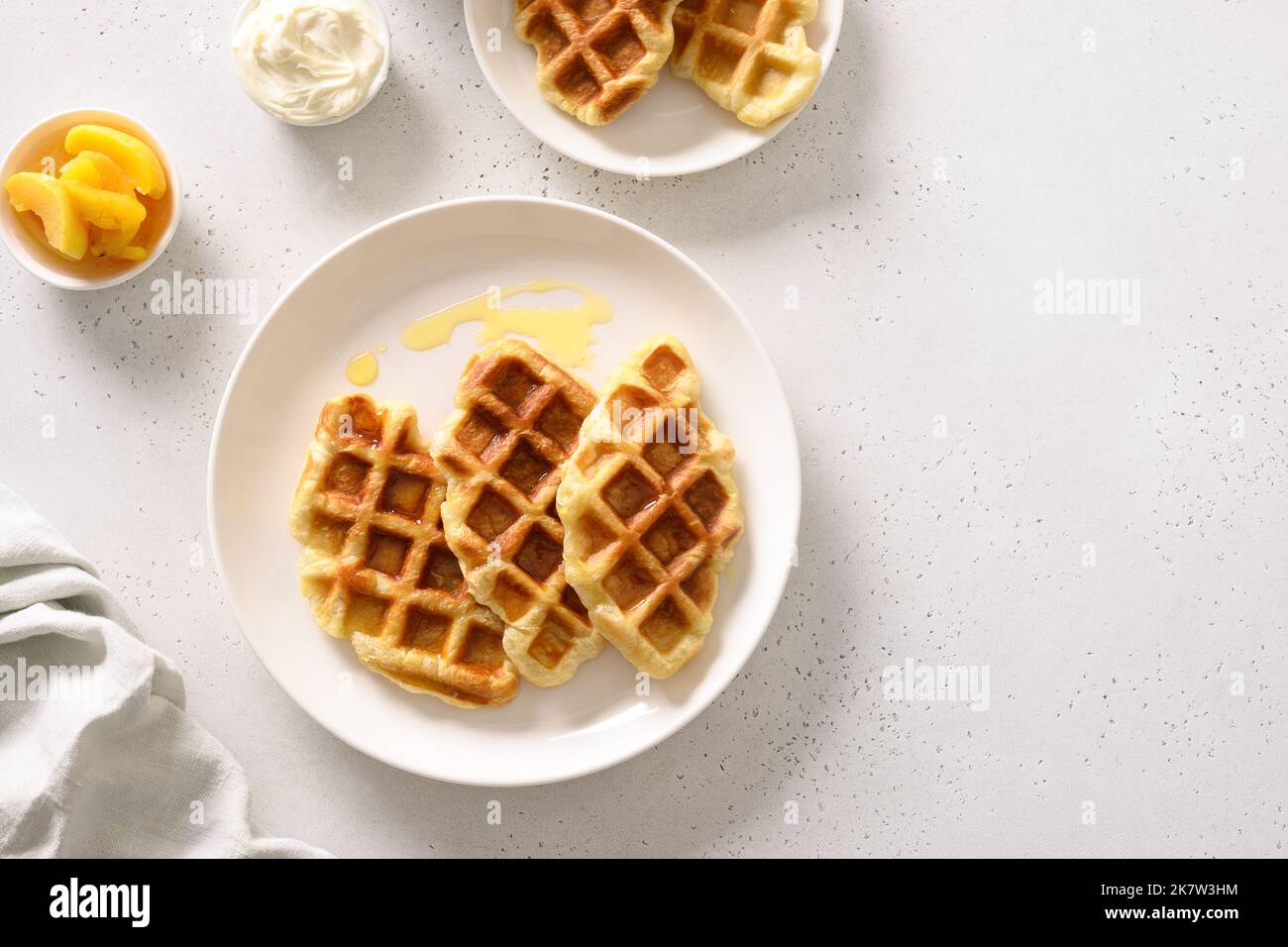 Popular croffles with mango for delicious breakfast on white background ...