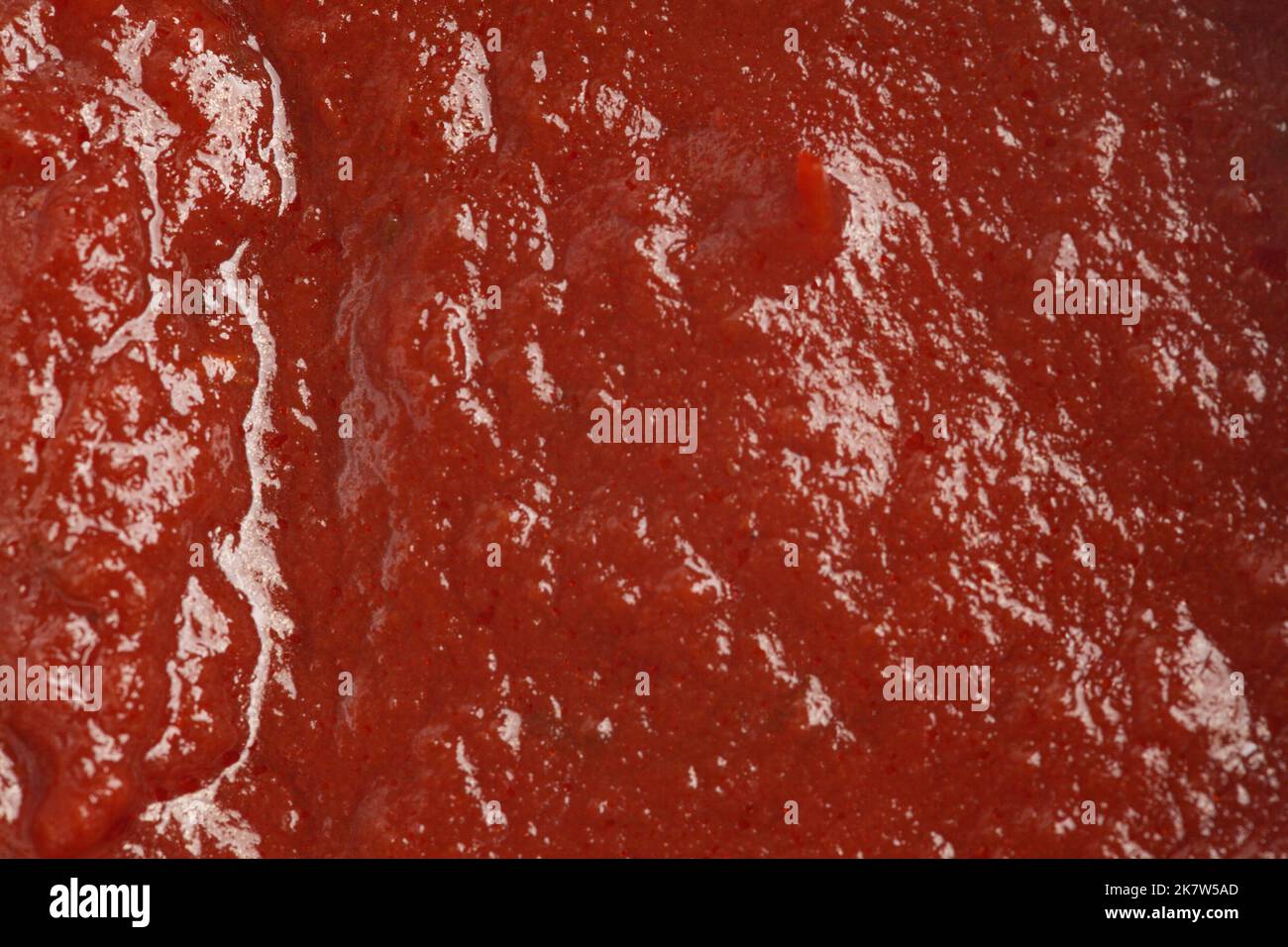 Tomato paste texture background close-up Stock Photo - Alamy