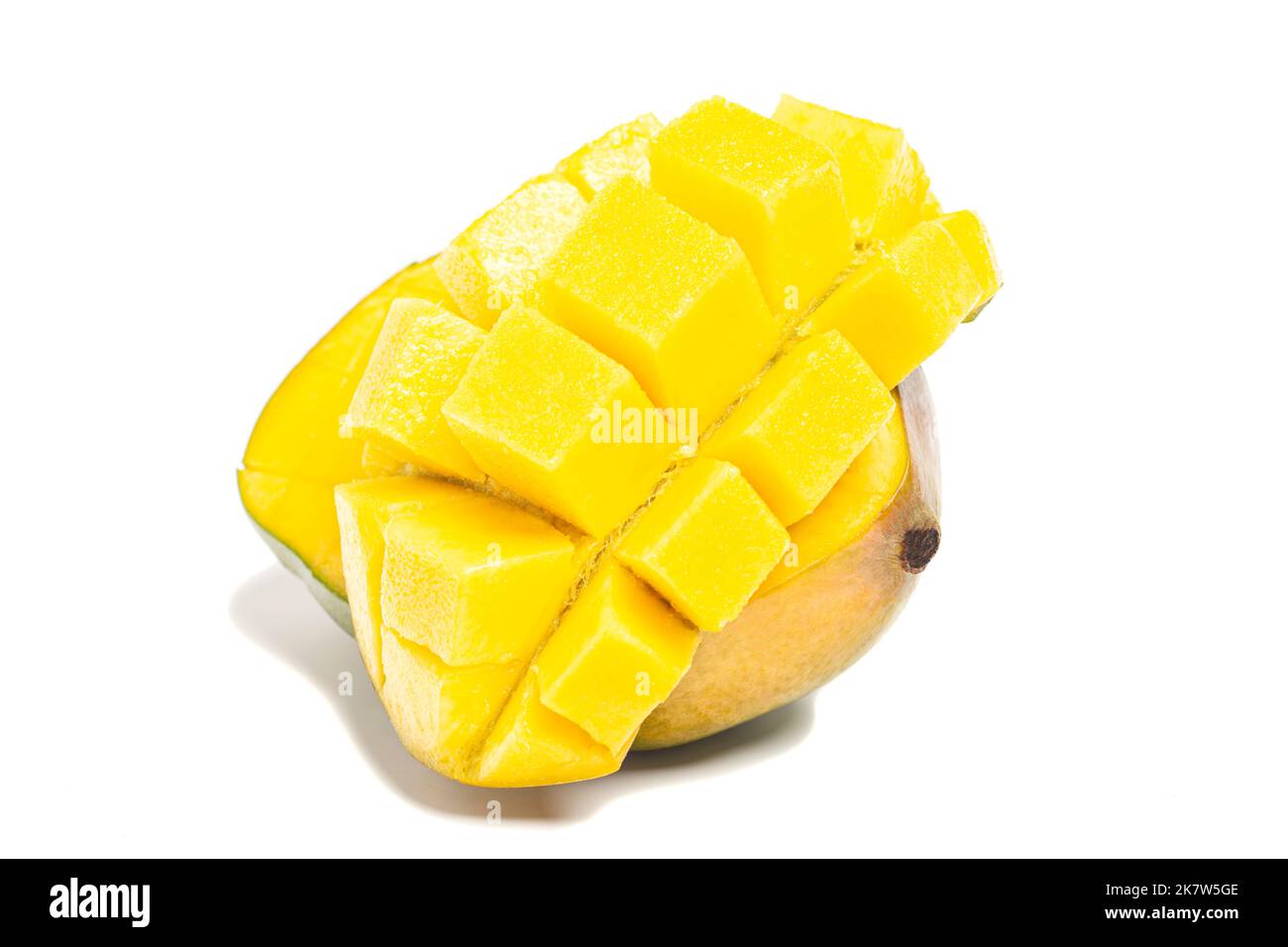 chopped half of ripe mango fruit isolated on white background Stock ...