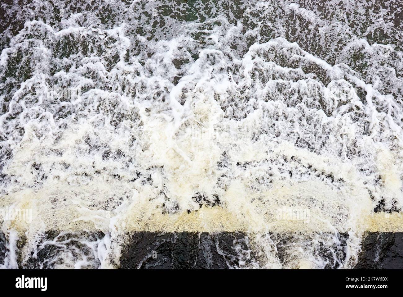 Foamed water top view with bubbles. Water foam waterfall threshold ...