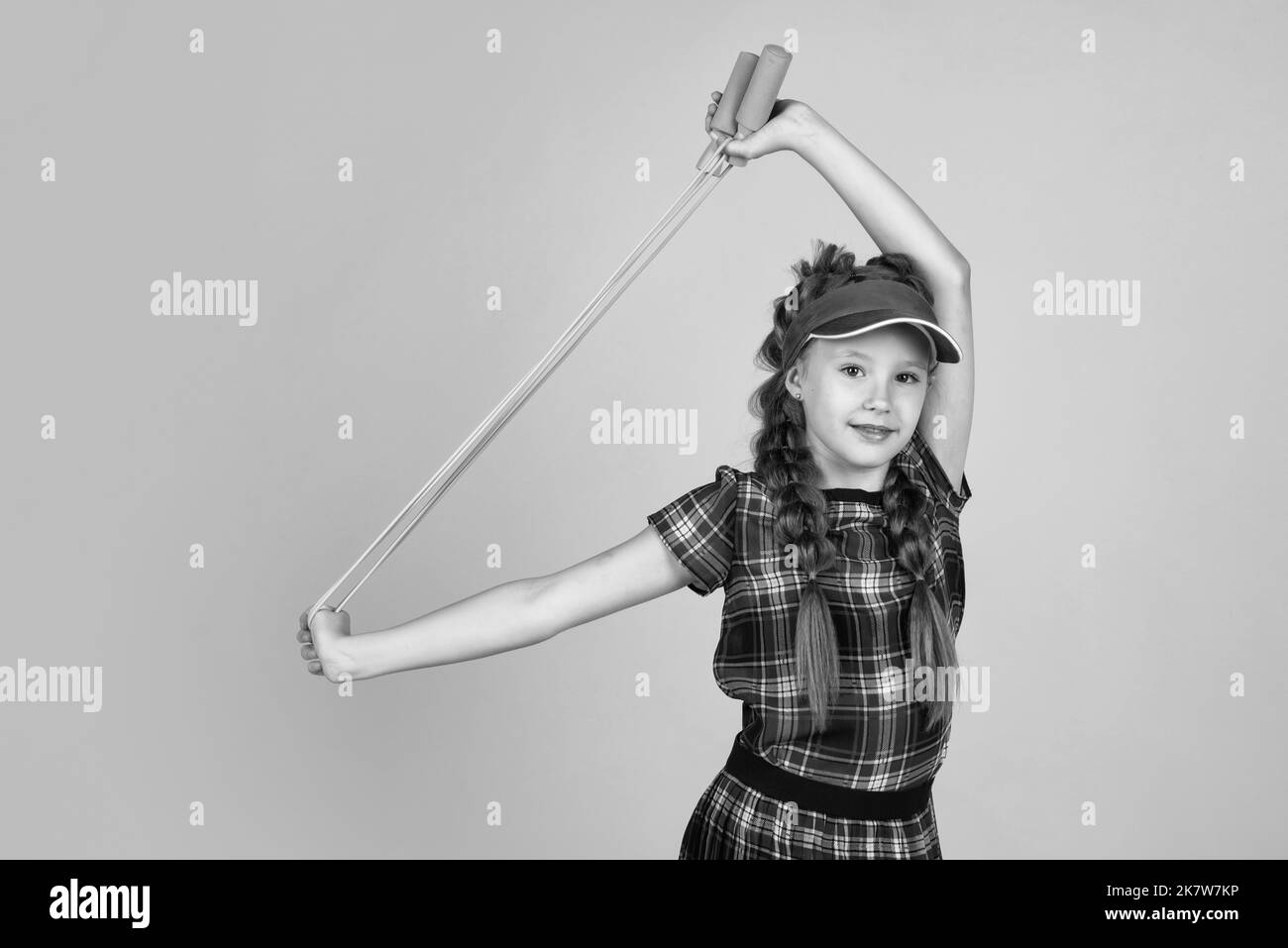 healthy sporty tween girl hold skipping rope, fitness Stock Photo - Alamy