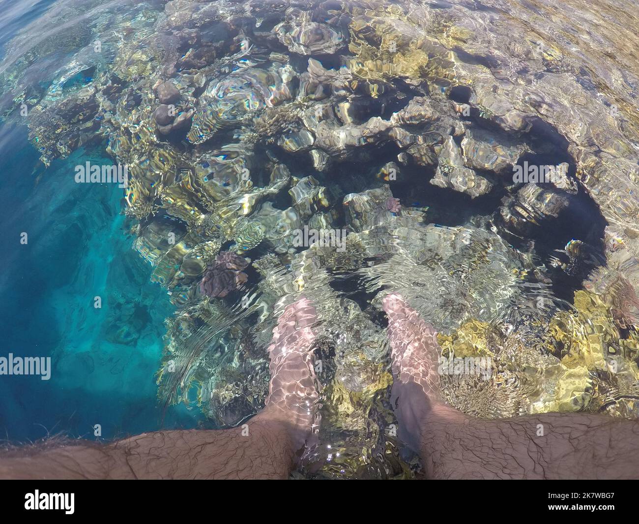 Feet in sea water hi-res stock photography and images - Alamy