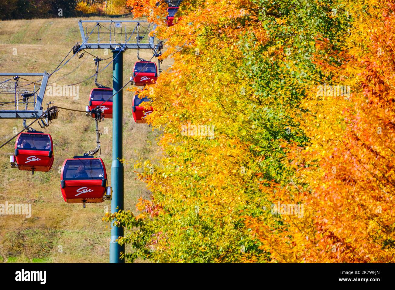 Autumn fall foliage tourists ride the gondola at Stowe Mountain Resort ...