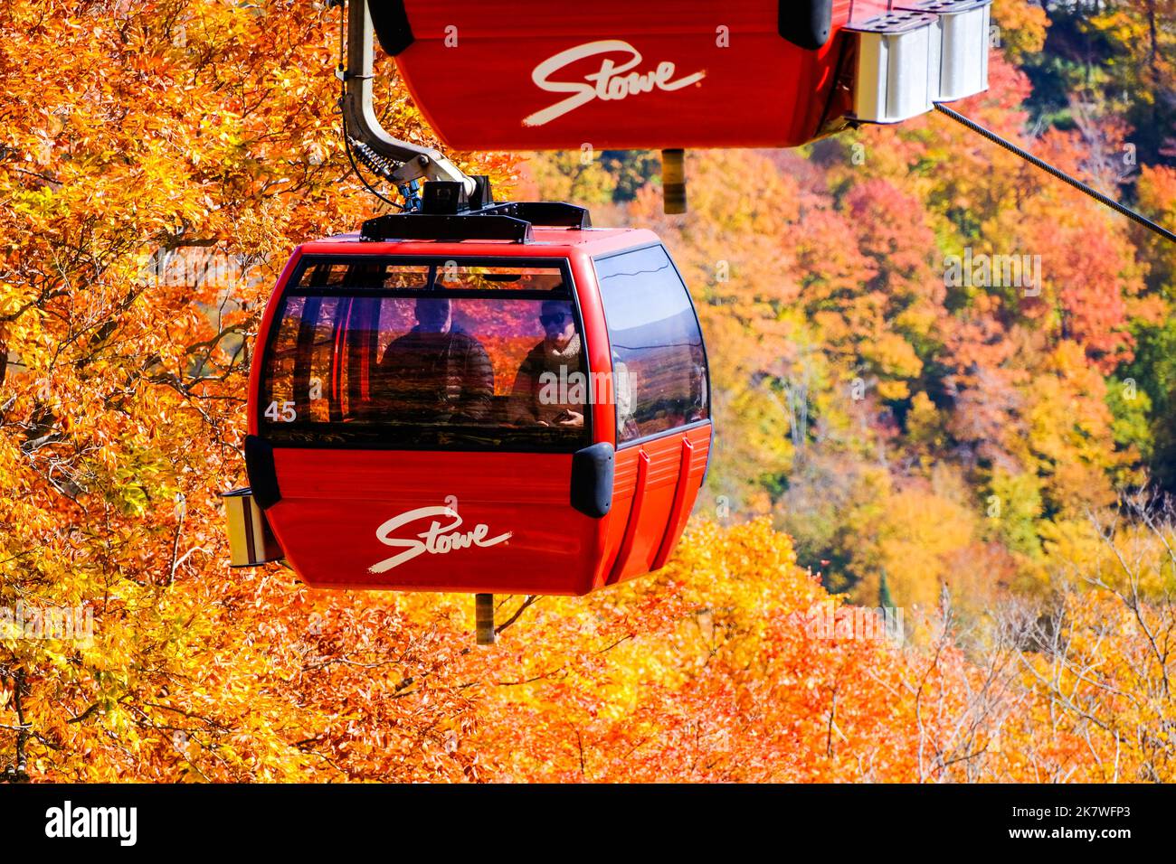 Autumn fall foliage tourists ride the gondola at Stowe Mountain Resort ...