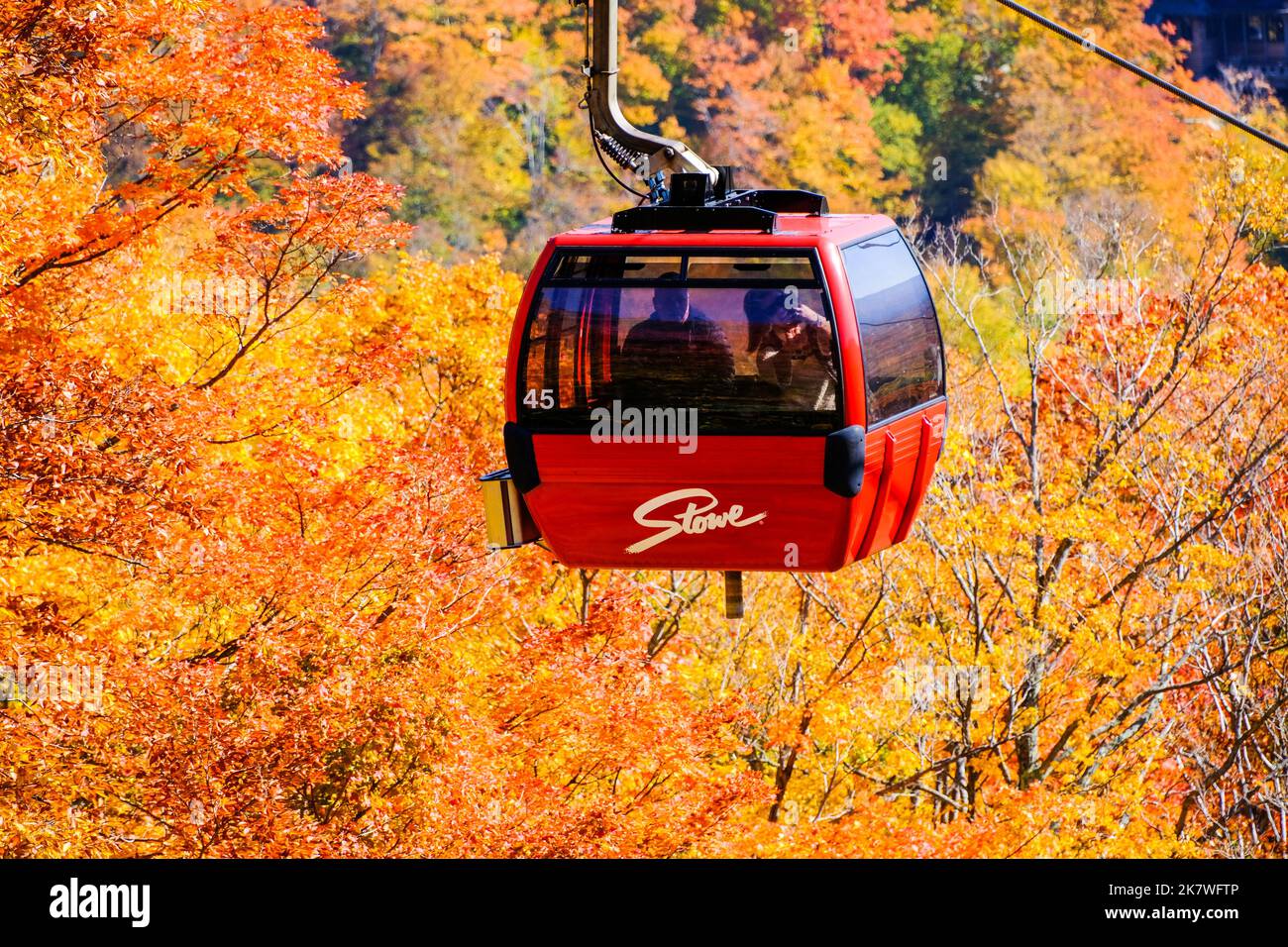 Autumn fall foliage tourists ride the gondola at Stowe Mountain Resort ...