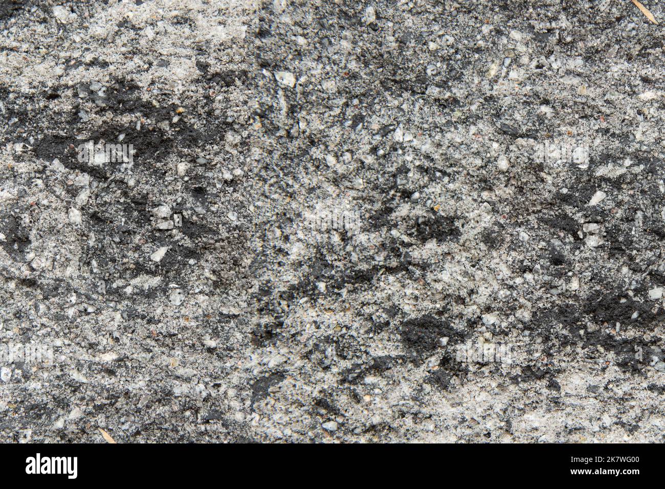 The texture of the stone wall - a close-up of a fragment of a fence ...