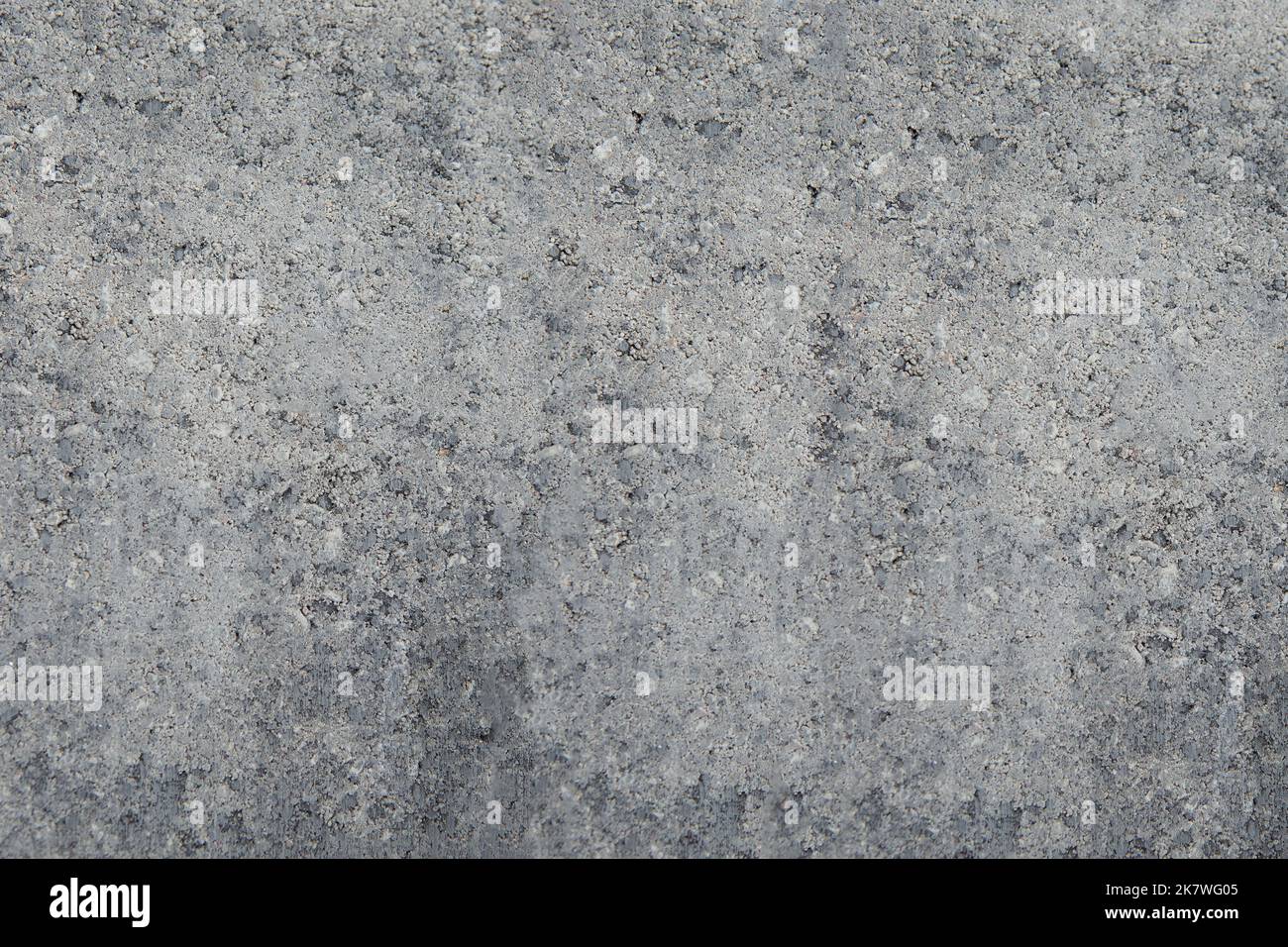 The texture of the stone wall - a close-up of a fragment of a fence ...