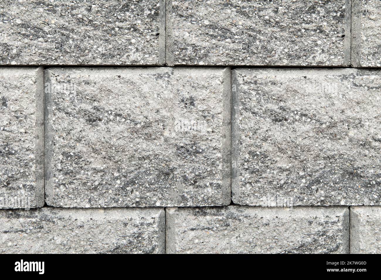 The texture of the stone wall - a close-up of a fragment of a fence ...