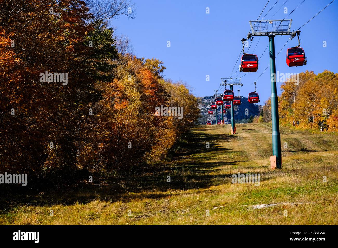 Autumn fall foliage tourists ride the gondola at Stowe Mountain Resort ...