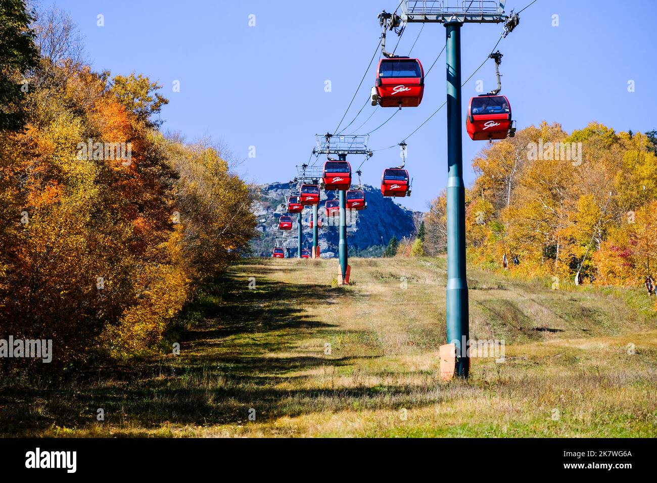 Autumn fall foliage tourists ride the gondola at Stowe Mountain Resort ...