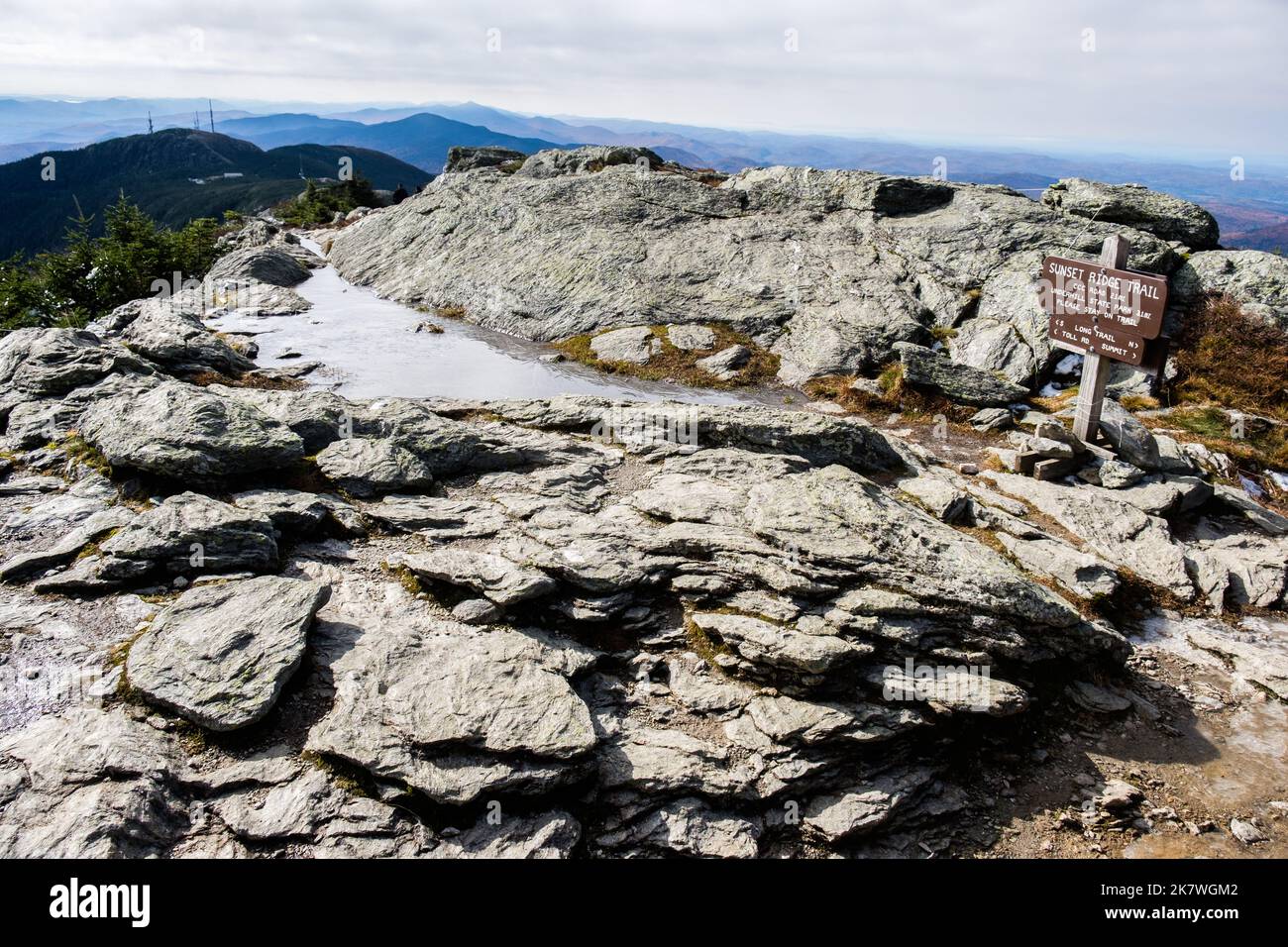 Autumn views and hikers on the summit ("The Chin") of Mt. Mansfield ...