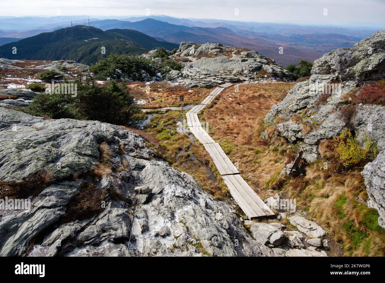 Autumn views and hikers on the summit ("The Chin") of Mt. Mansfield ...