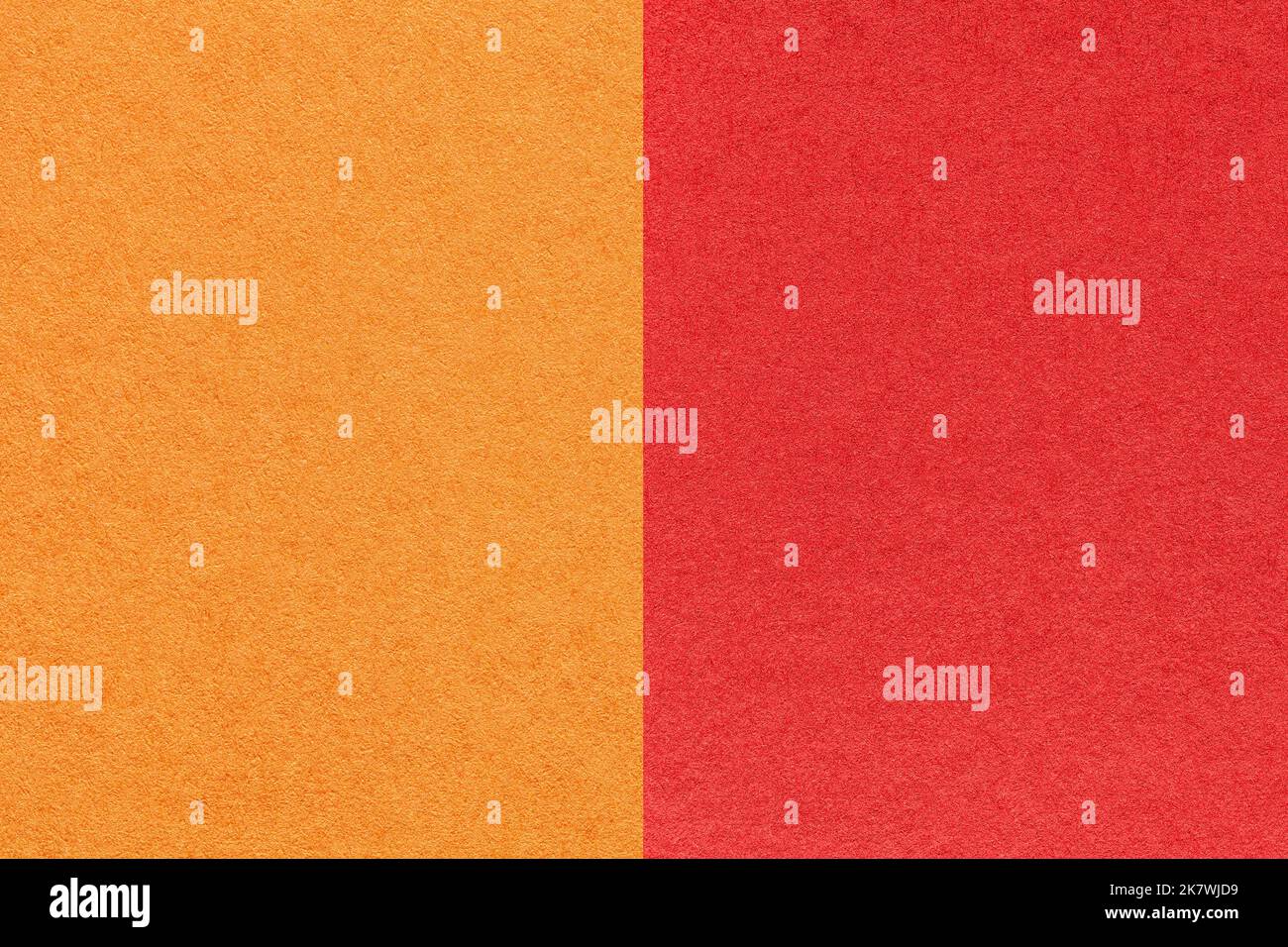 Texture of craft bright orange and red paper background, half two ...