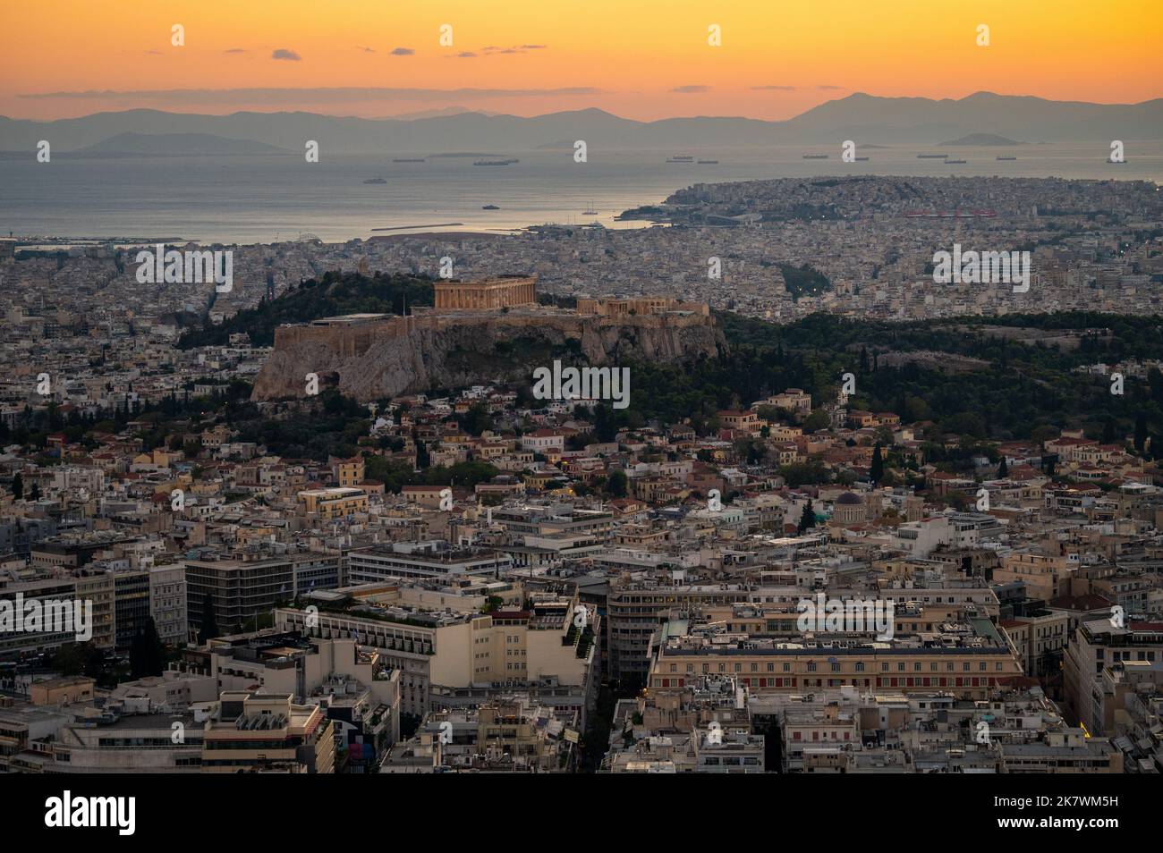 View of The Acropolis of Athens with the Parthenon seen from Mount Lycabettus during sunset ...