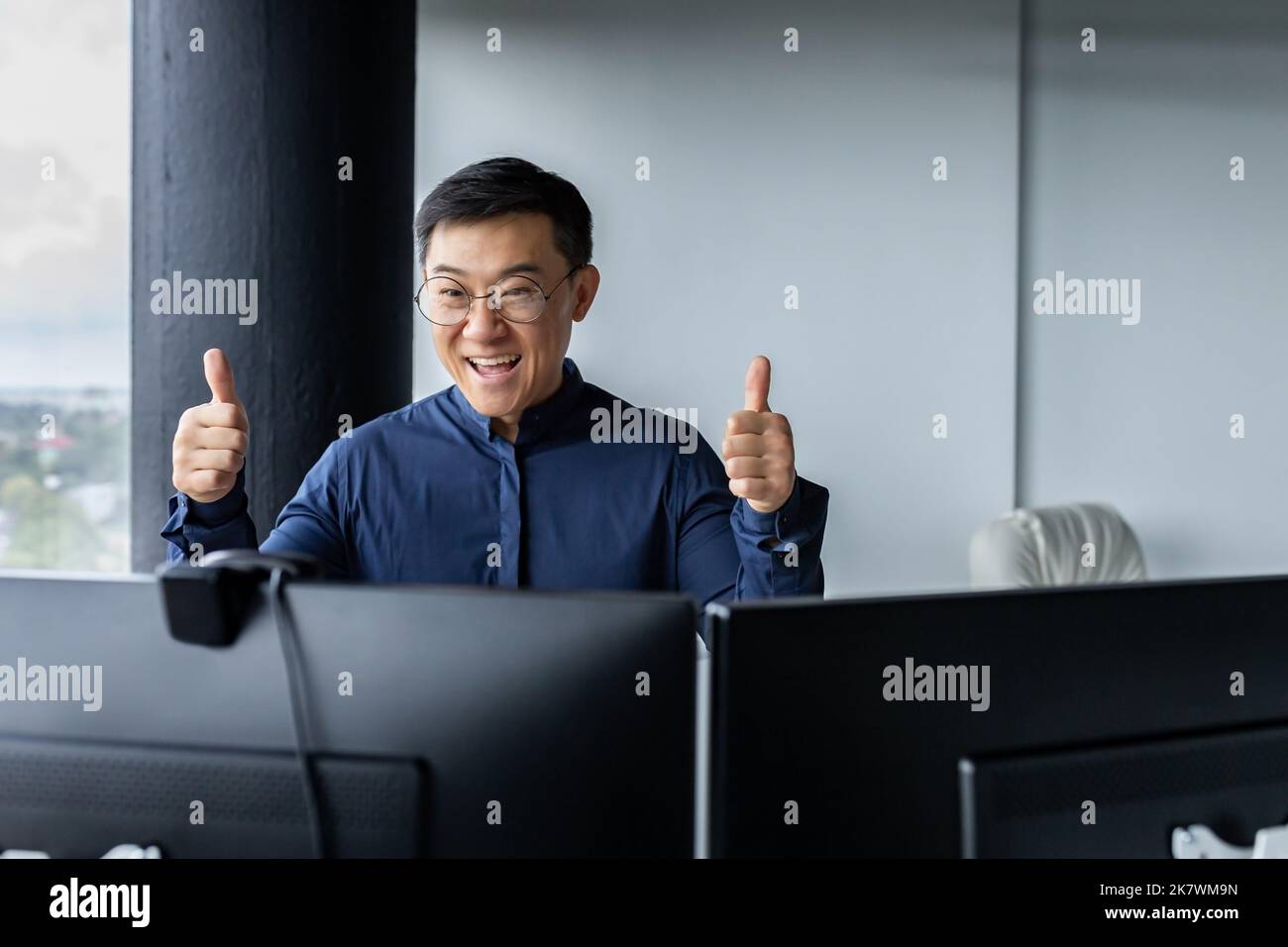 Person celebrating success thumbs hi-res stock photography and images ...