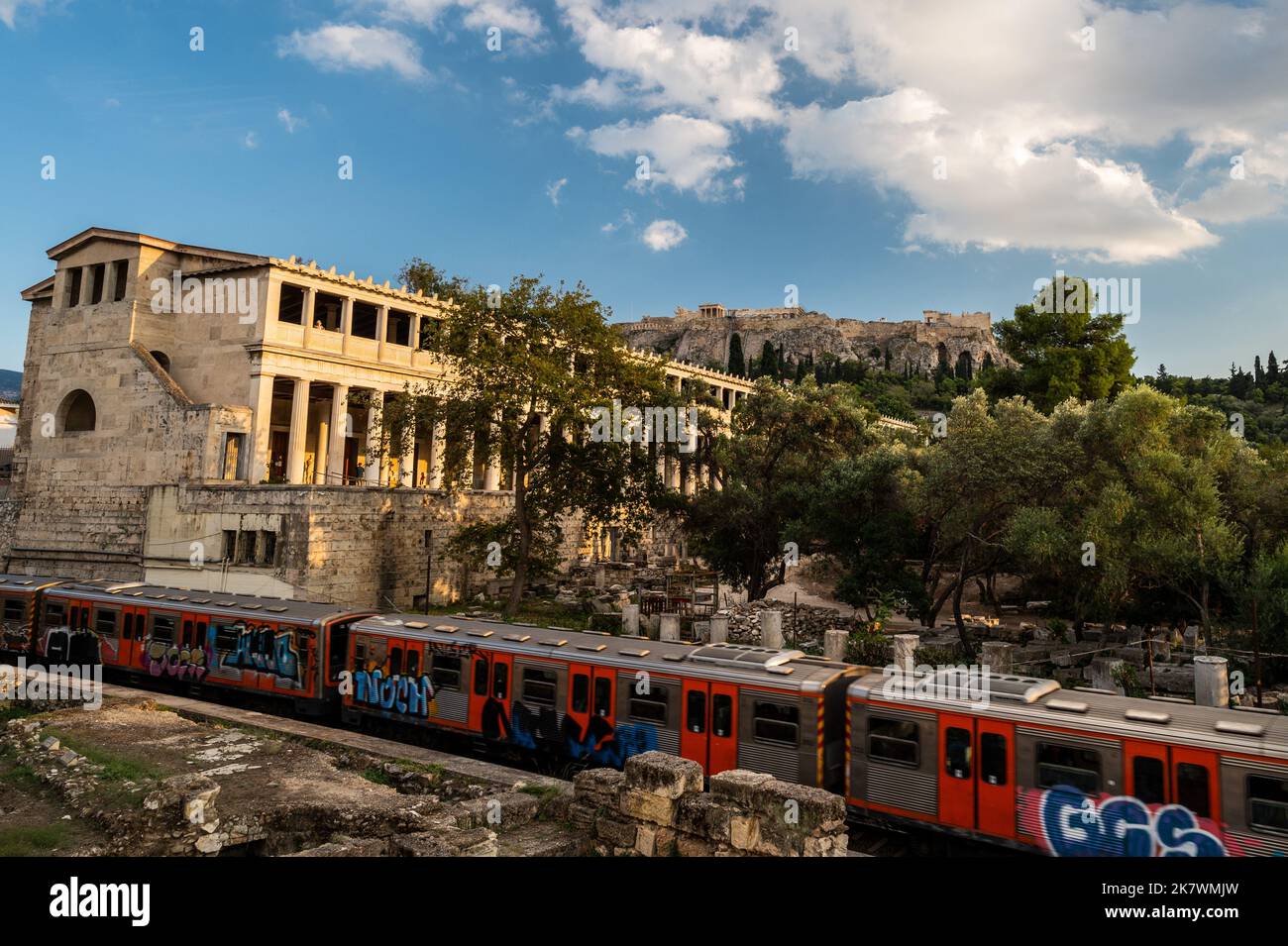 A train passes by near the Acropolis of Athens Stock Photo - Alamy
