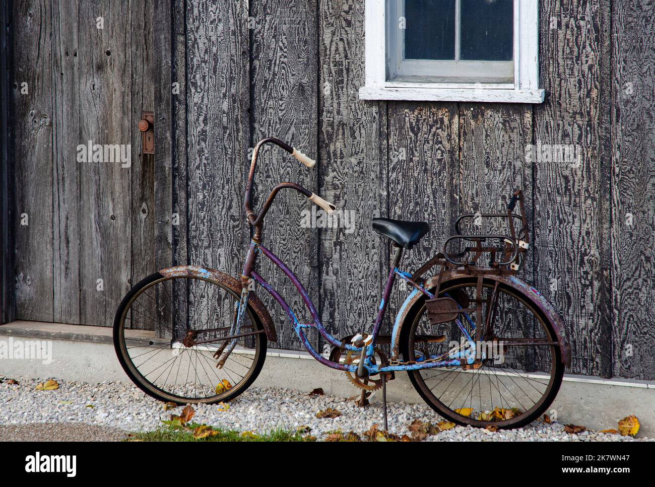 An old bicycle stands against an out building at the Grand View ...