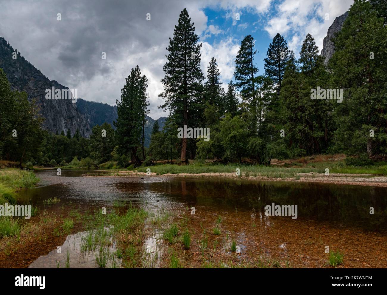 Clouds from a clearing storm slide awaya from the skies over the Merced ...