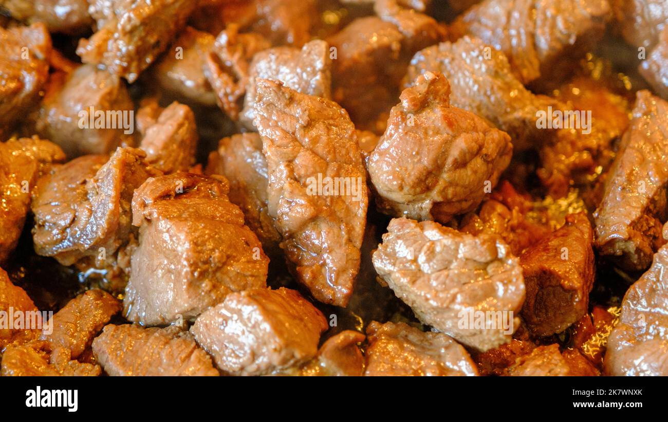 Lightly fried cut venison into pieces for a healthy meal Stock Photo ...
