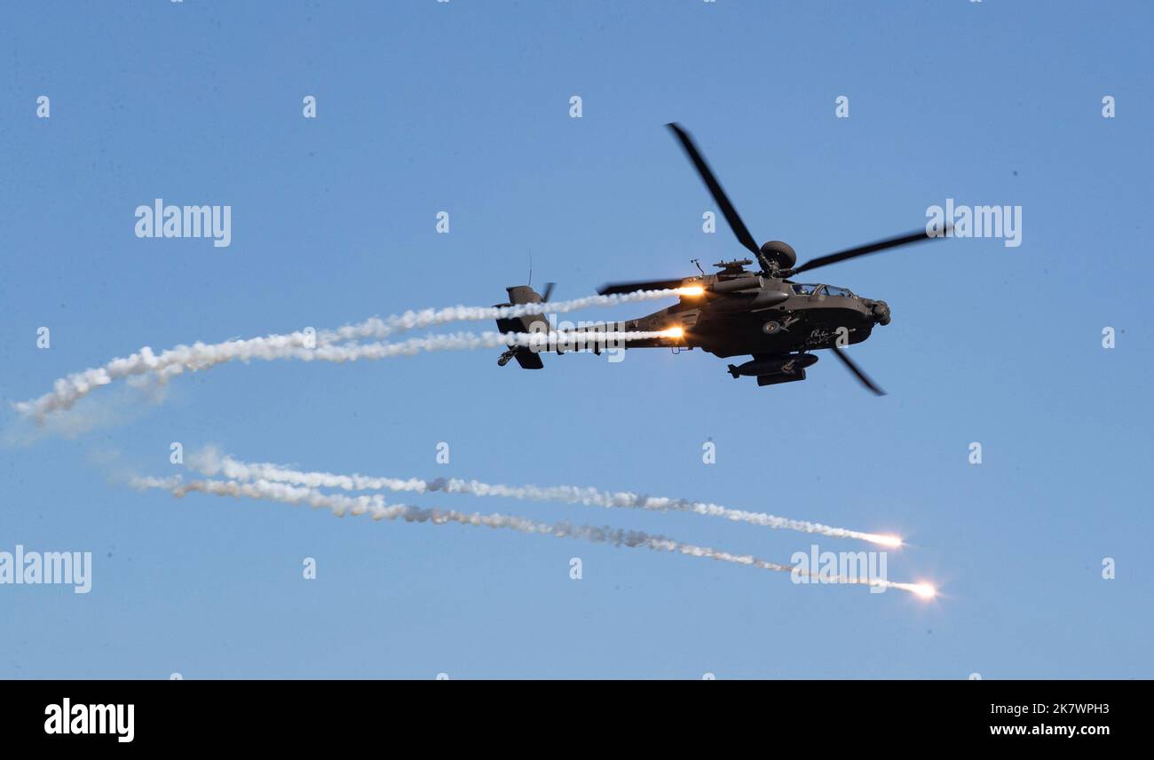 Yeoju, South Korea. 19th Oct, 2022. An AH64 Apache helicopter flies ...