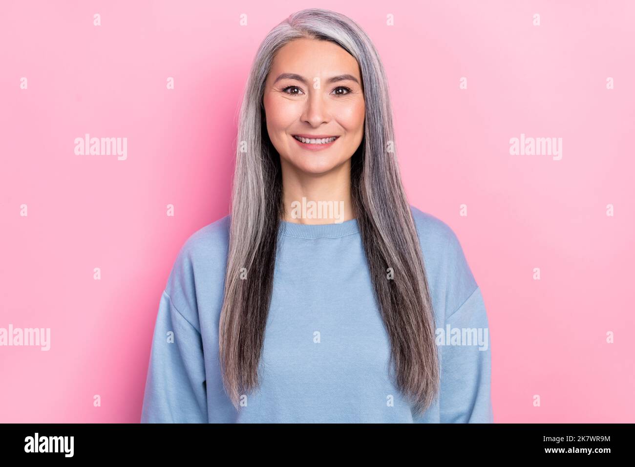 Photo of adorable charming retired woman blue sweater smiling isolated ...
