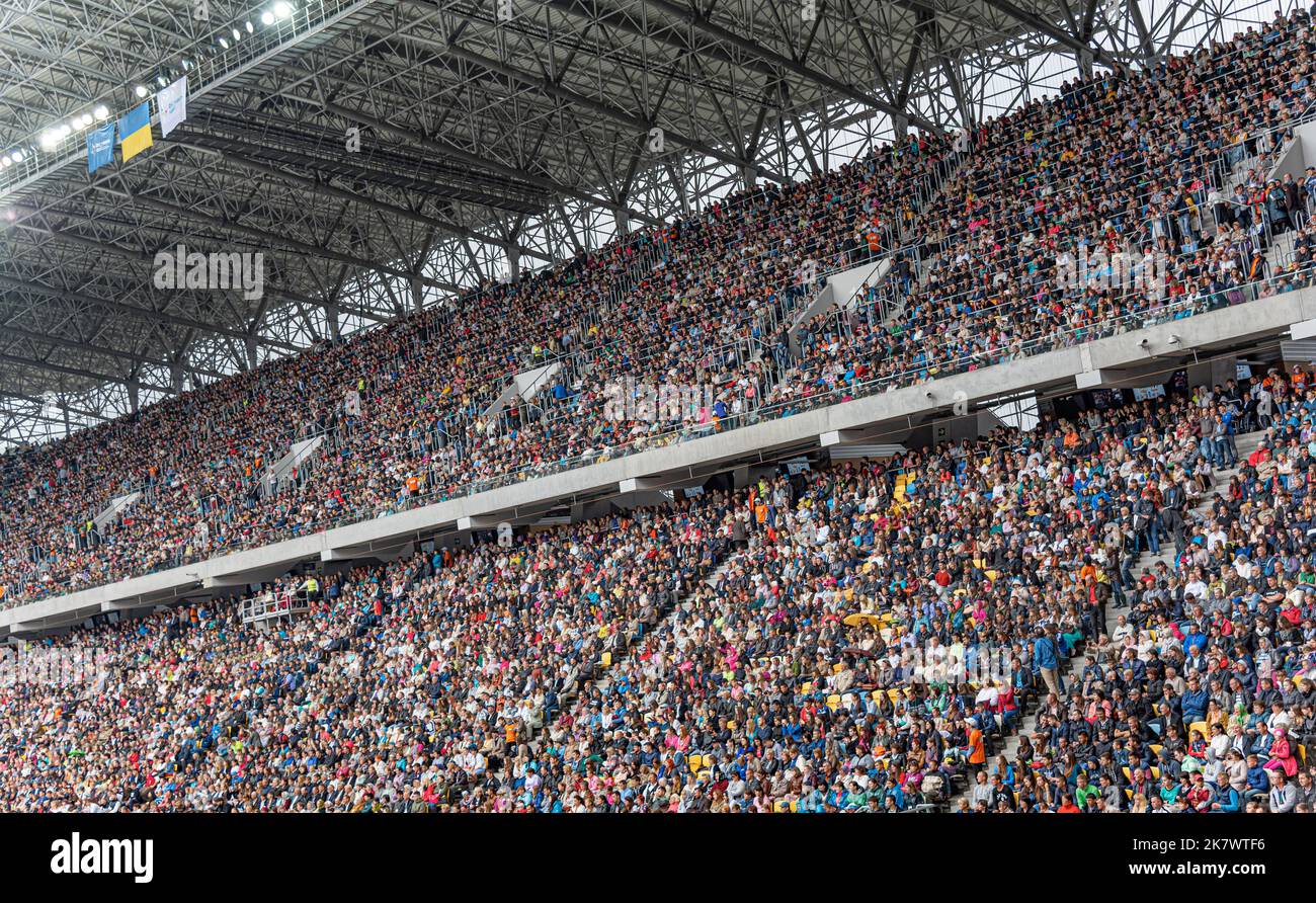 Spectators on the podium of the stadium Lviv-Arena Stock Photo - Alamy