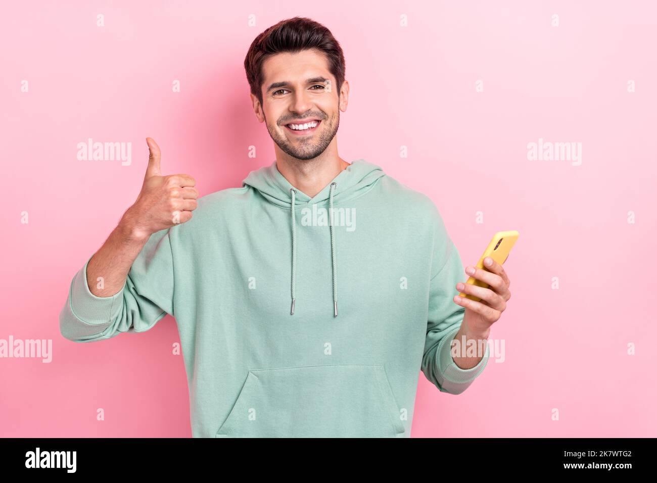 Photo of youngster positive successful man showing thumb up like ...