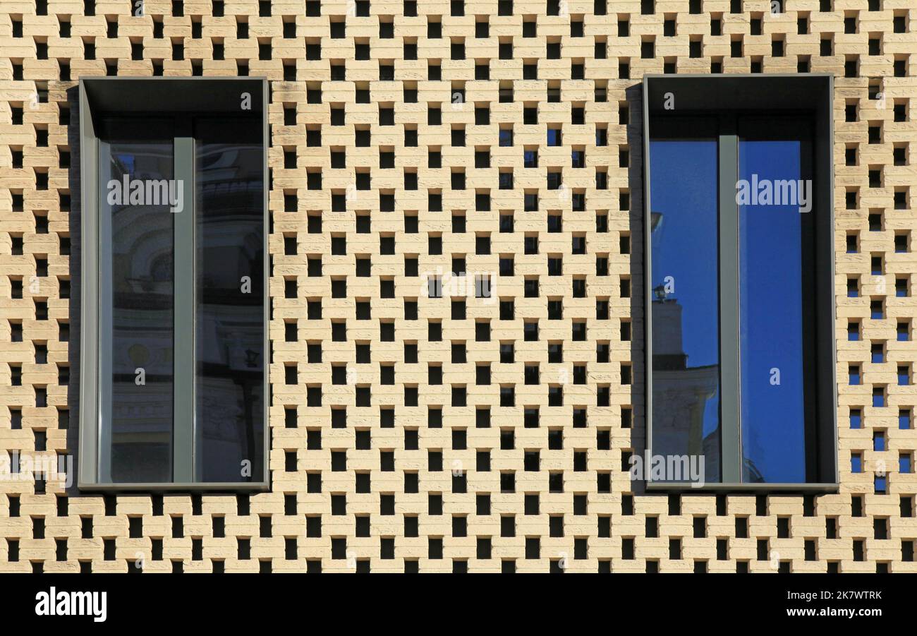 Windows of office building. Hinged and ventilated facade. Honeycomb and ...