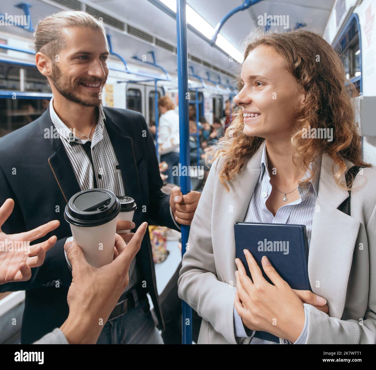 group of young people on a subway train Stock Photo - Alamy