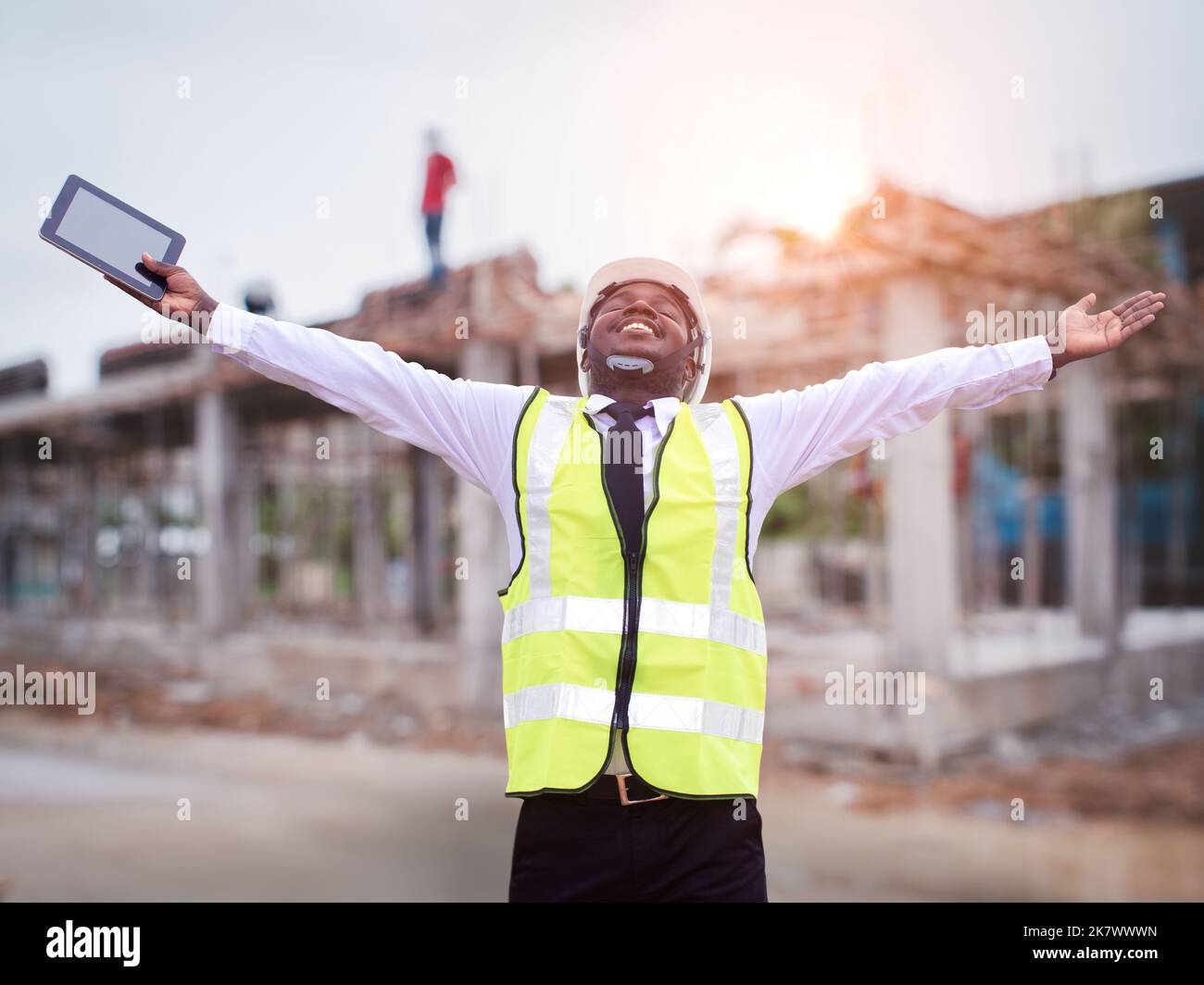 African architects engineer man with tablet work together in the inside ...