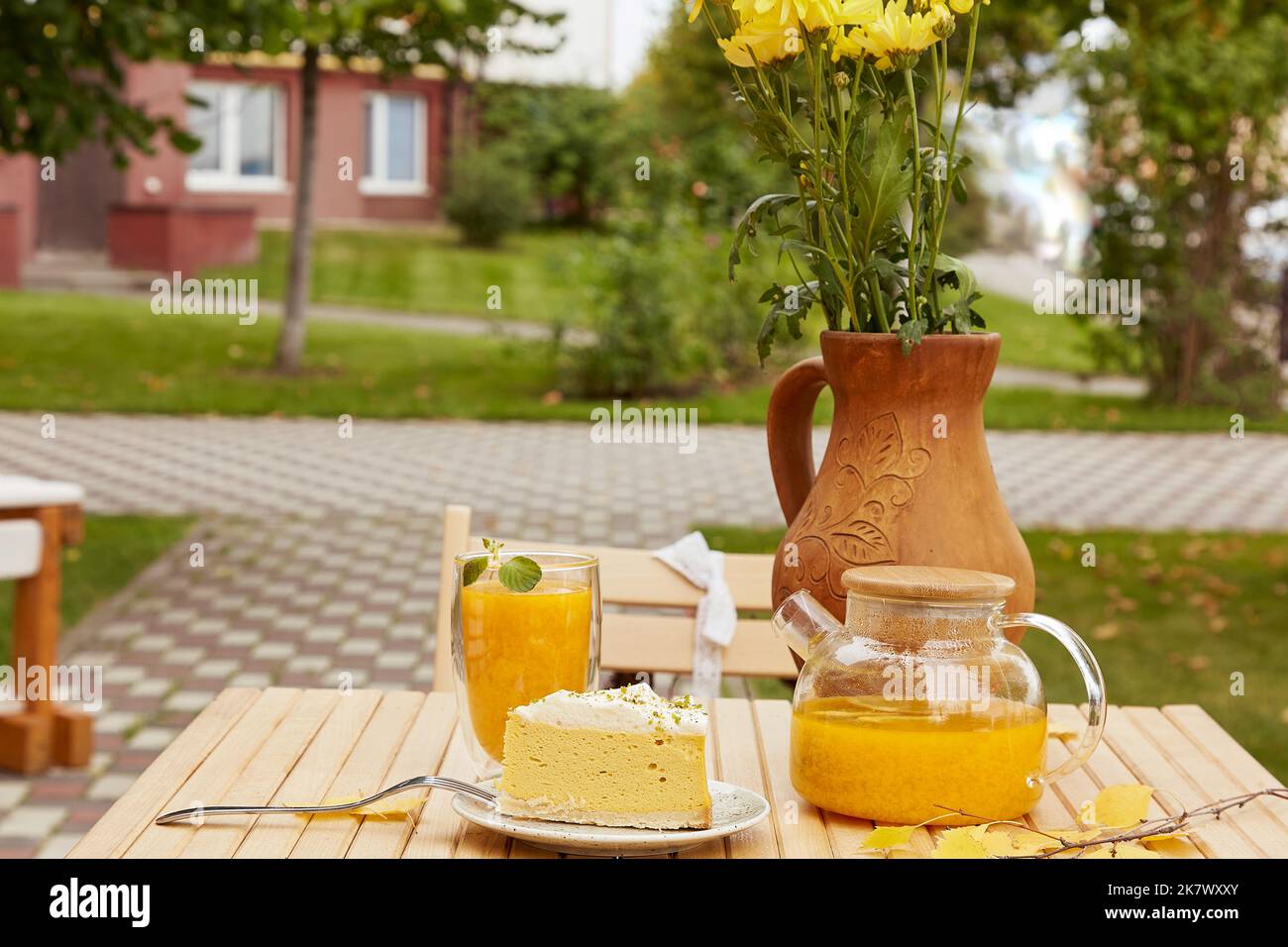 Aesthetic autumn breakfast with healthy sea buckthorn tea and vegan ...
