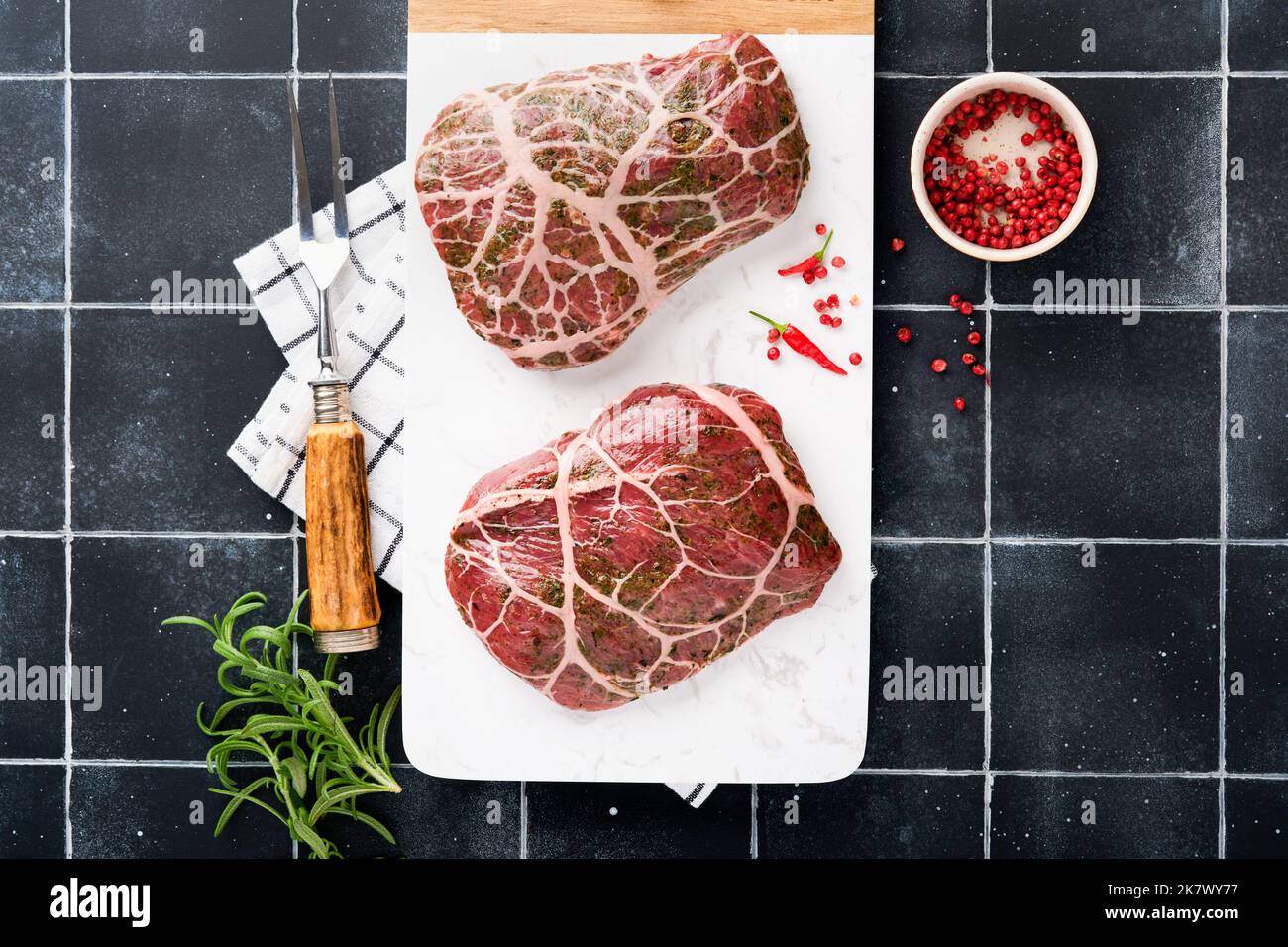Steaks Raw. Raw cowboy steak, marbled beef meat with spices rosemary ...