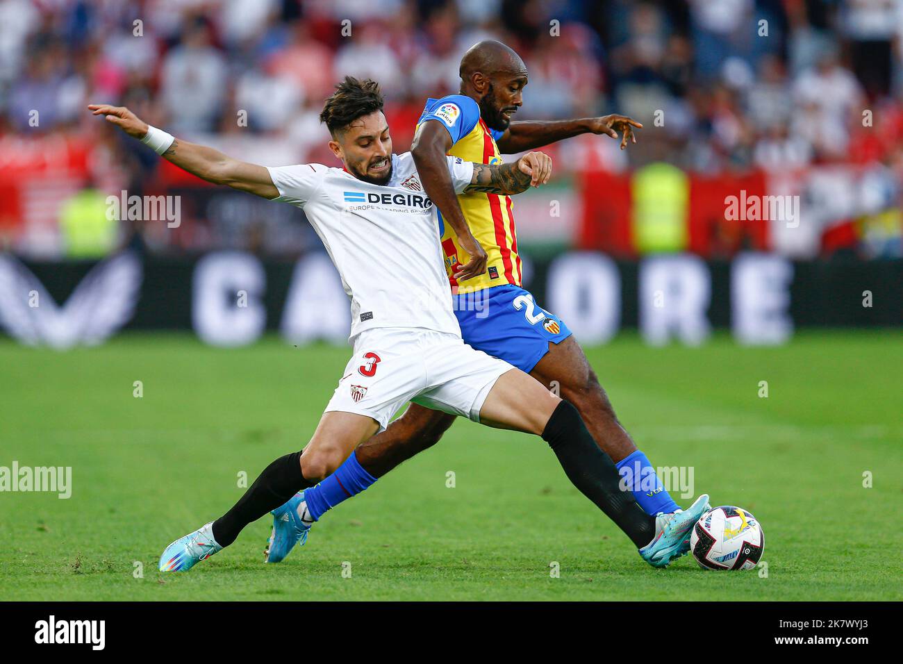 Alex Telles of Sevilla FC and Dimitri Foulquier of Valencia during the ...