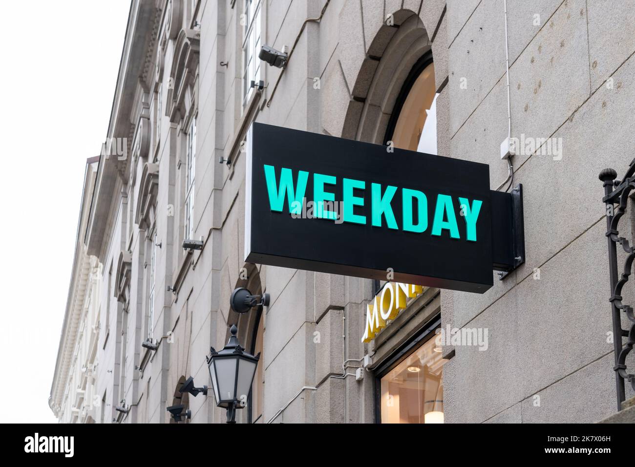 Oslo, Norway - October 15, 2022: Weekday store projecting sign on the ...