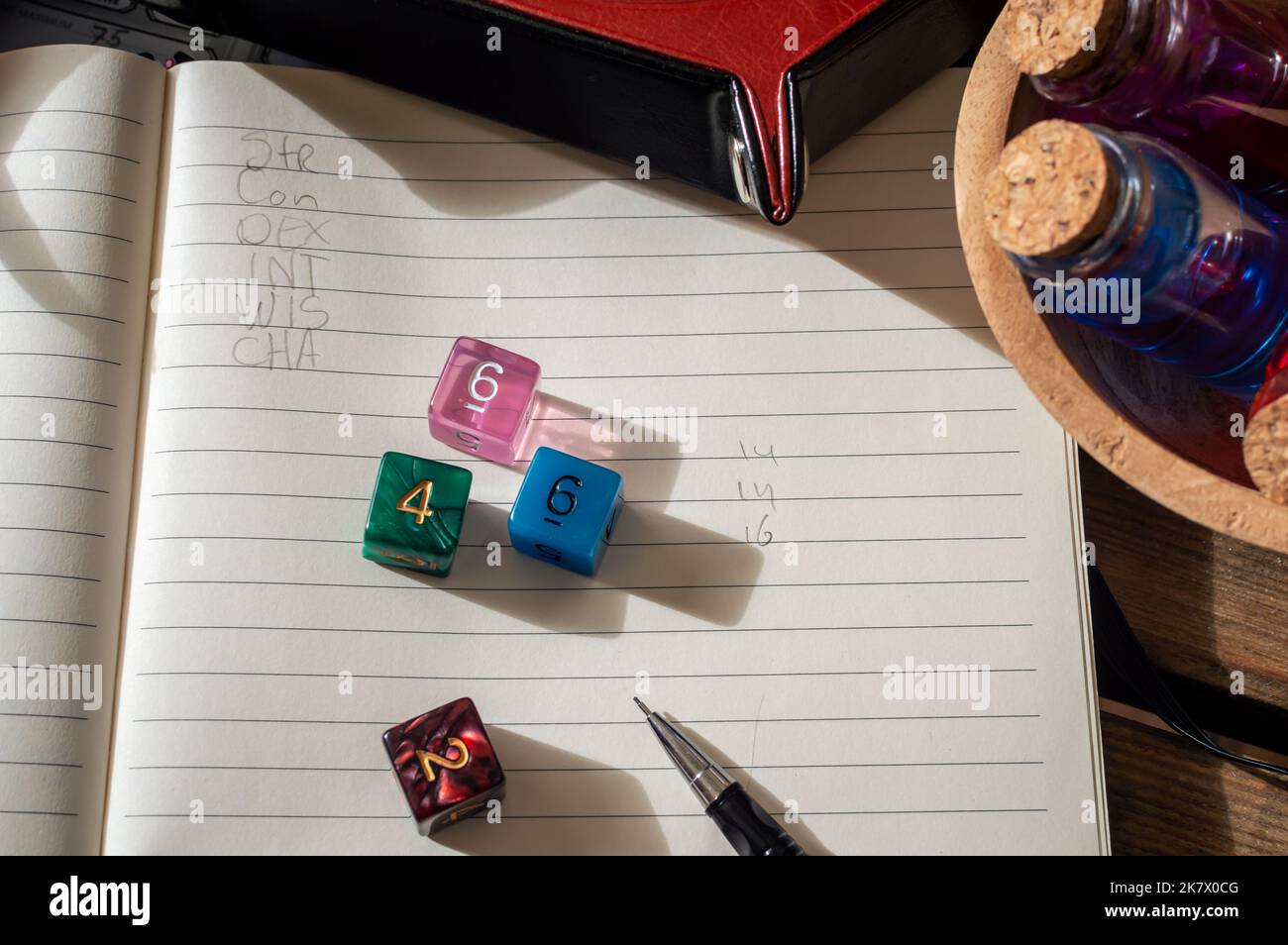 Close-up image of 4 colorful dice used to role for table Top RPG ...