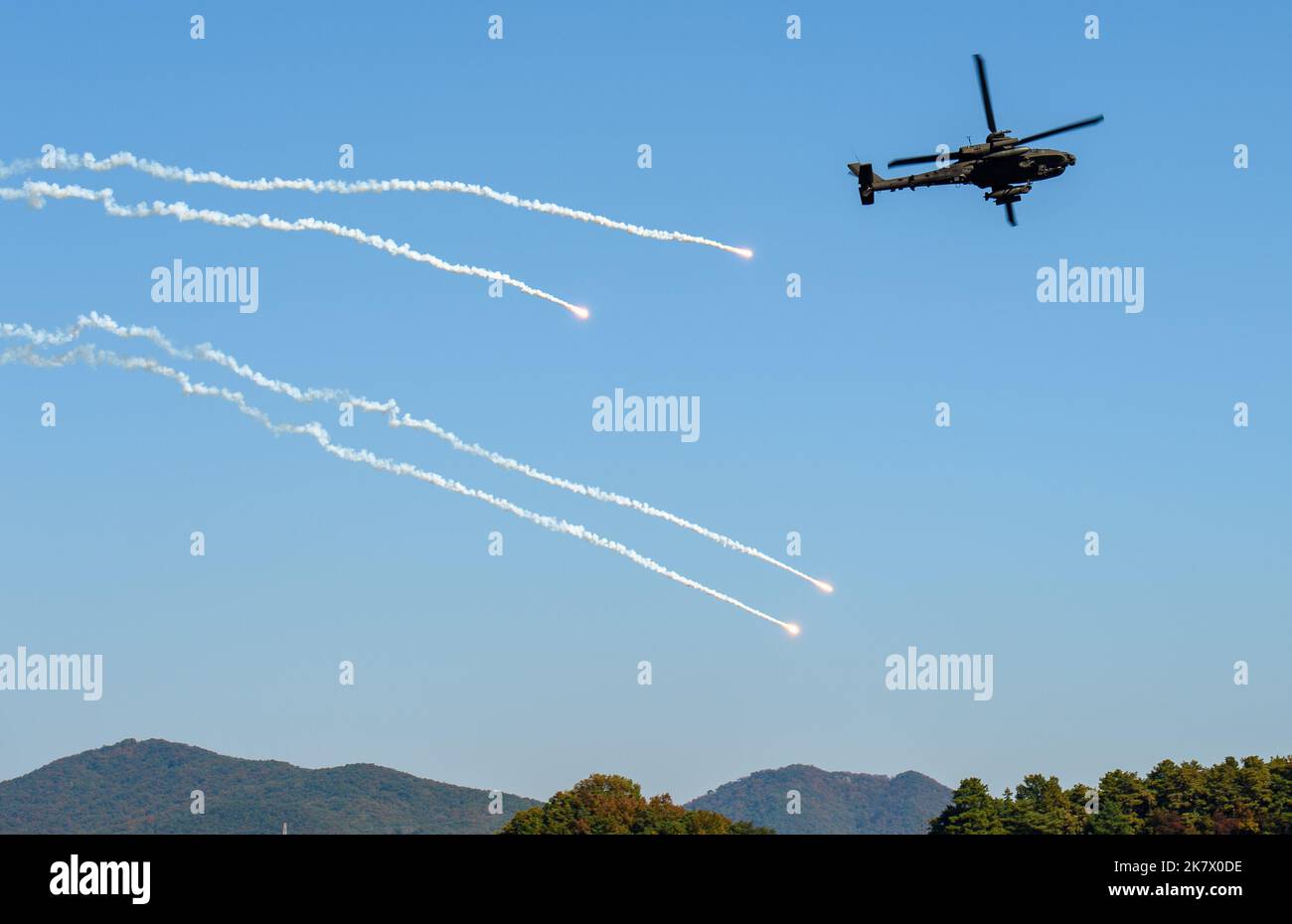 South Korea's AH-64 Apache helicopter fires flare shells during a South ...