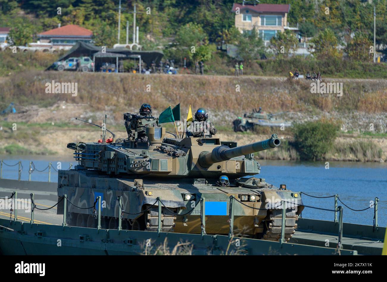 A South Korean Army K-2 tank crosses a floating bridge during a South ...