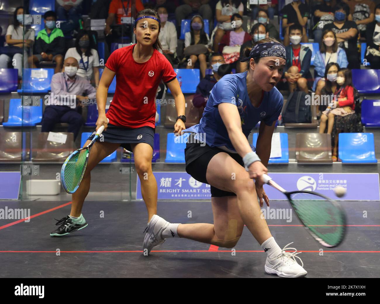 Tong Tsz-wing (blue) in action against Lee Ka-yi (red) during the ...