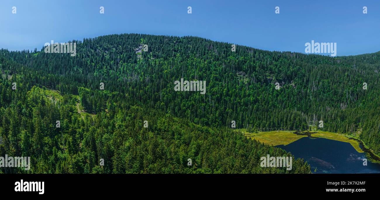 The beautiful embedded Great Arber Lake in Bavarian Forest from above ...